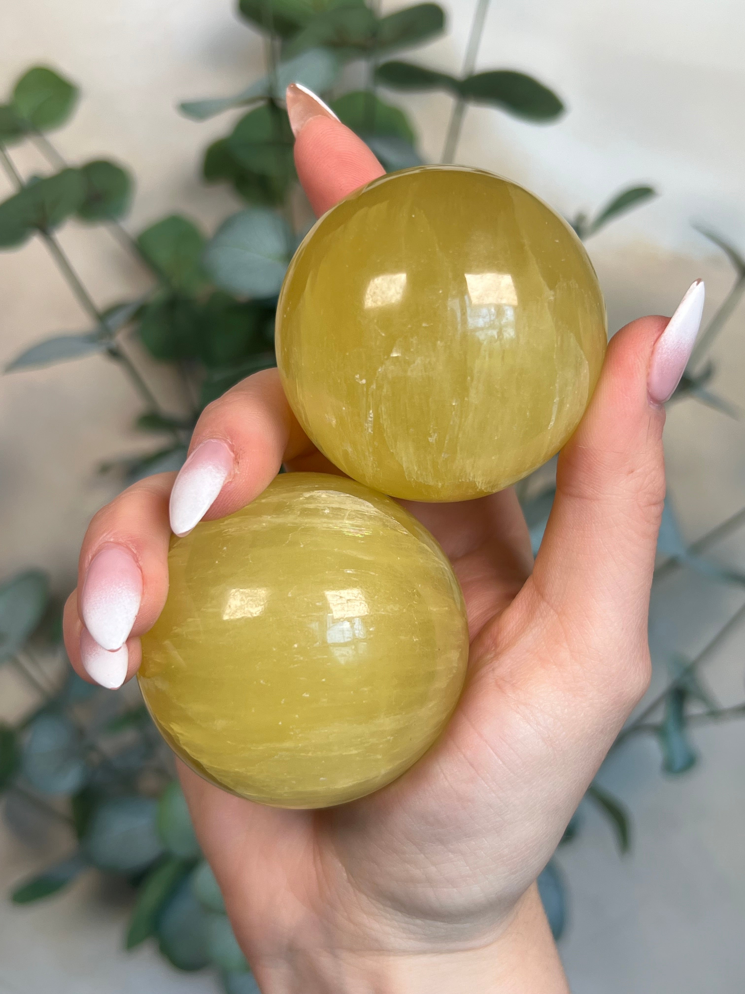 Lemon Calcite Sphere – Calm and Collective Minerals